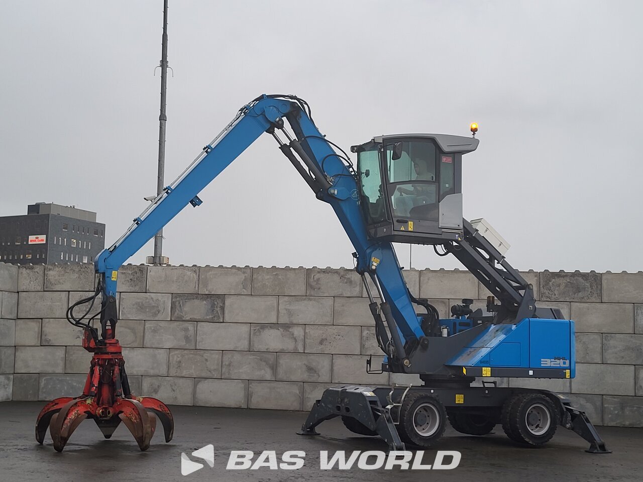 Fuchs MHL320 T4F Overslagmachine - BAS World